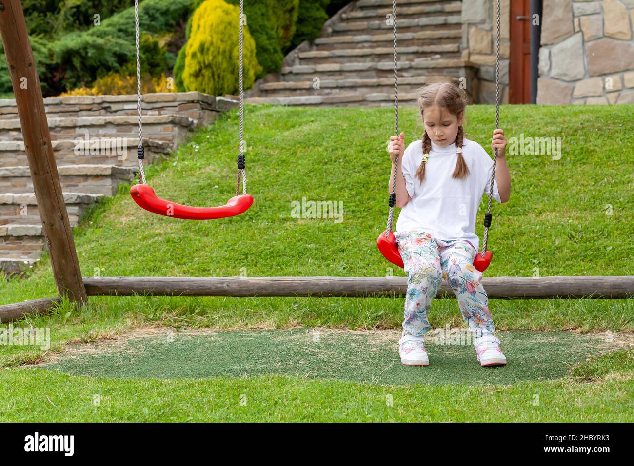 Child Playing Alone At School