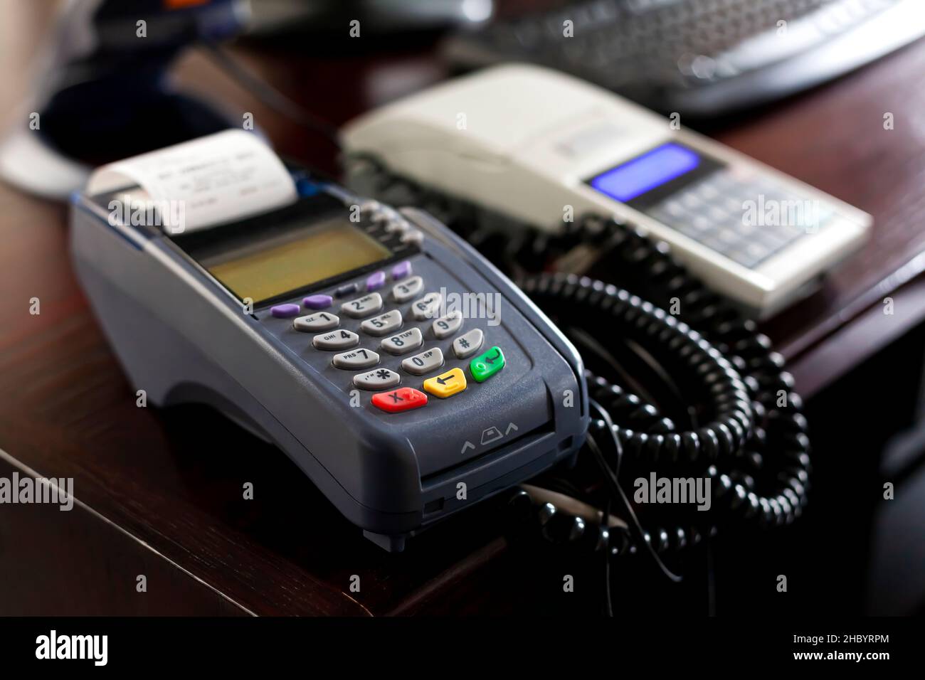 Point of sale, POS terminal device on the table in a store office ...