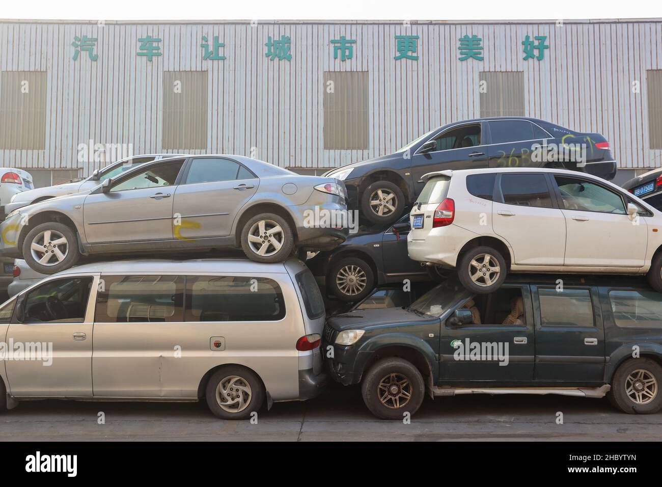 WUXI, CHINA - DECEMBER 22, 2021 - Scrapped cars are parked at Wuxi ...