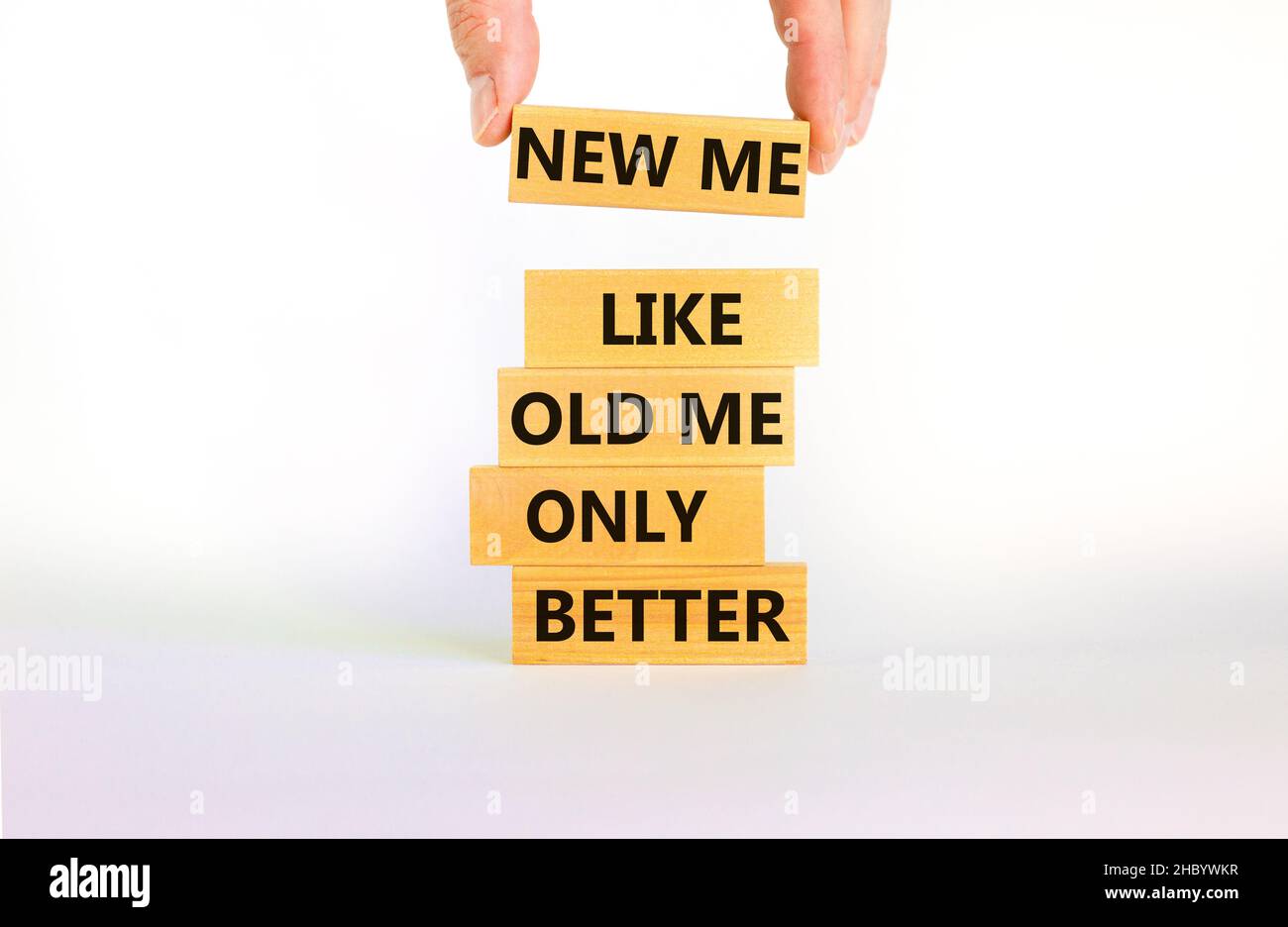 Better new me symbol. Wooden blocks with words 'new me like old me only ...