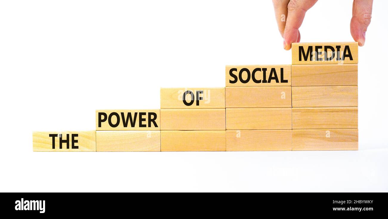 Power of social media symbol. Wooden blocks with words The power of ...