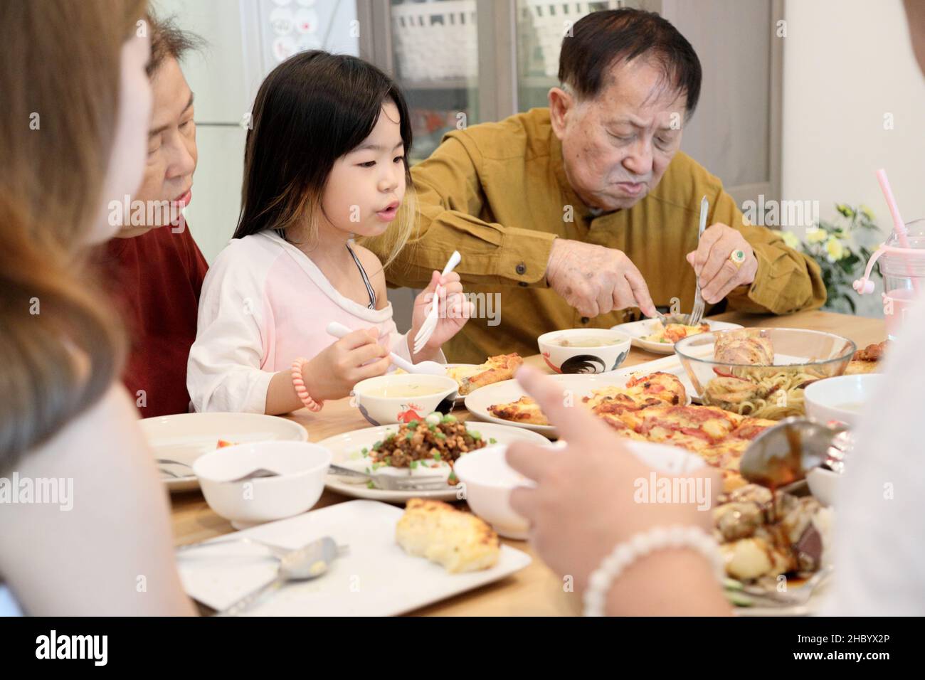 Chinese family have variety food togethrer Stock Photo - Alamy