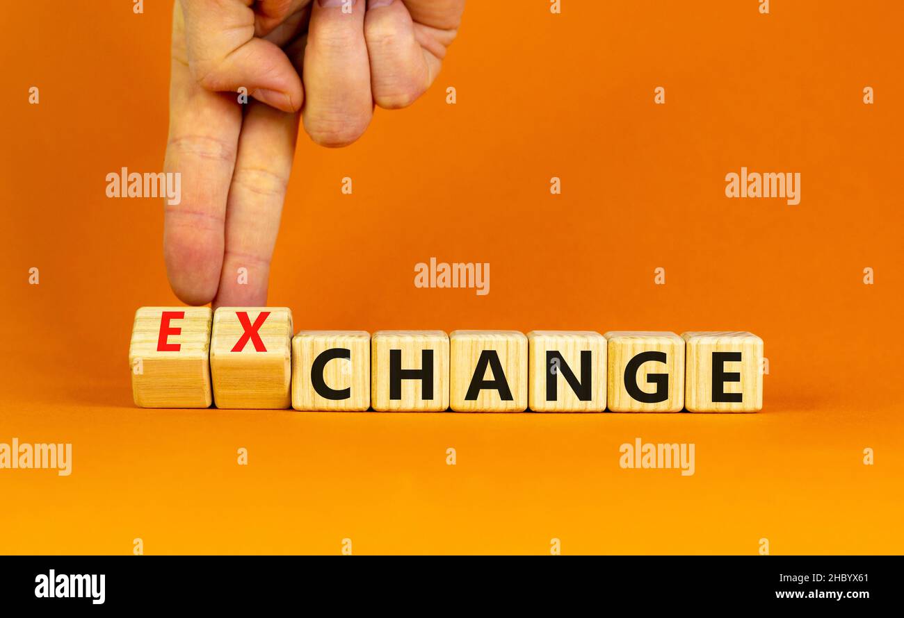 Change or exchange symbol. Businessman turns wooden cubes and changes ...