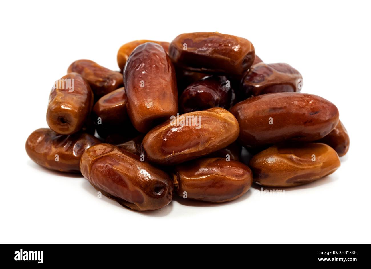 Dates close-up on a white background. Isolate of a bunch of dates ...