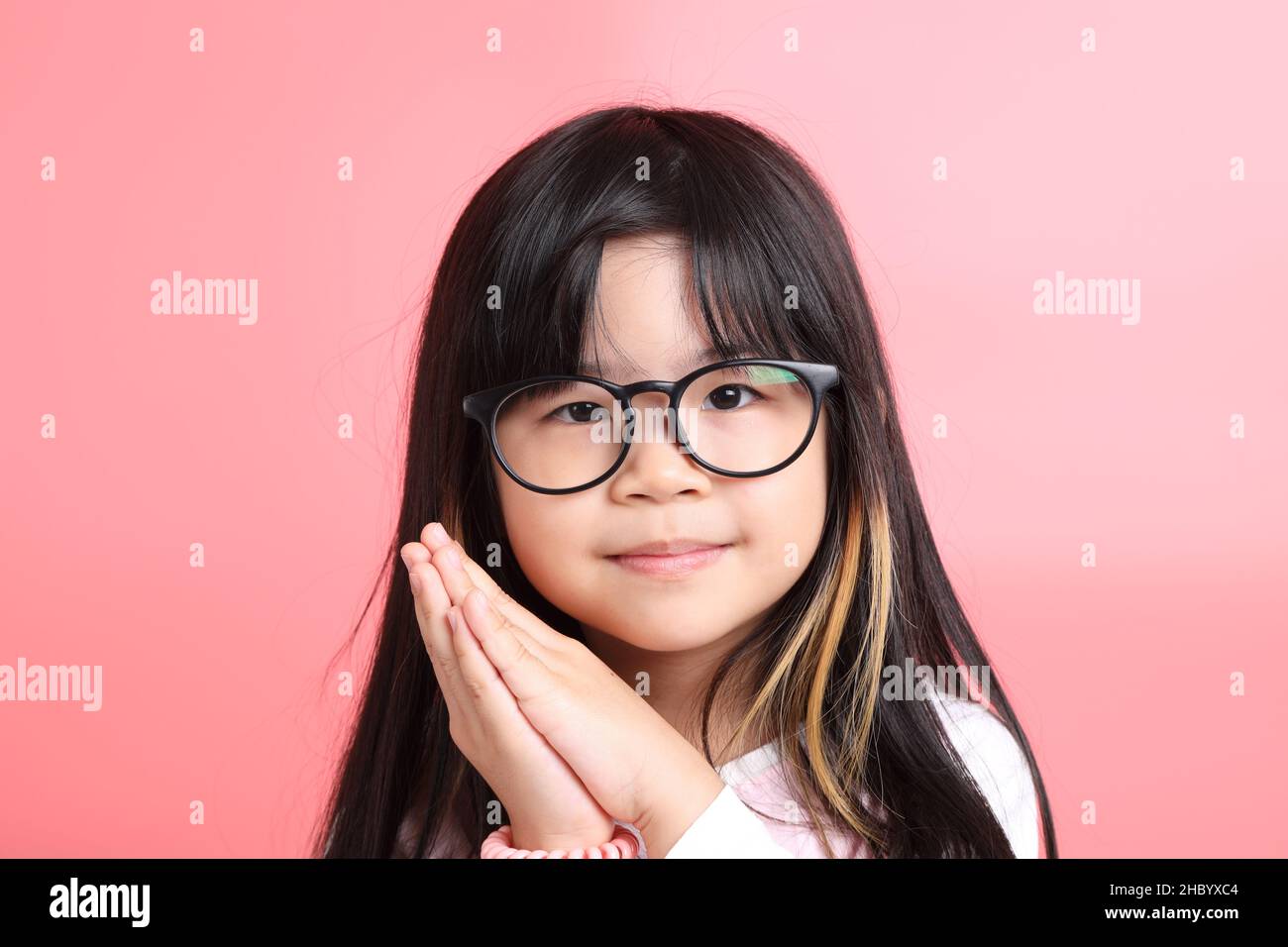 The young Asian girl portrait on the pink background Stock Photo - Alamy
