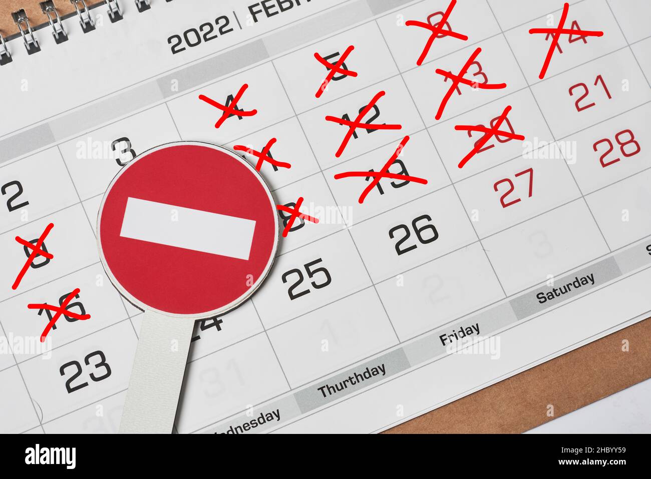 February days crossed with red marker. Symbol of boycotting Winter ...