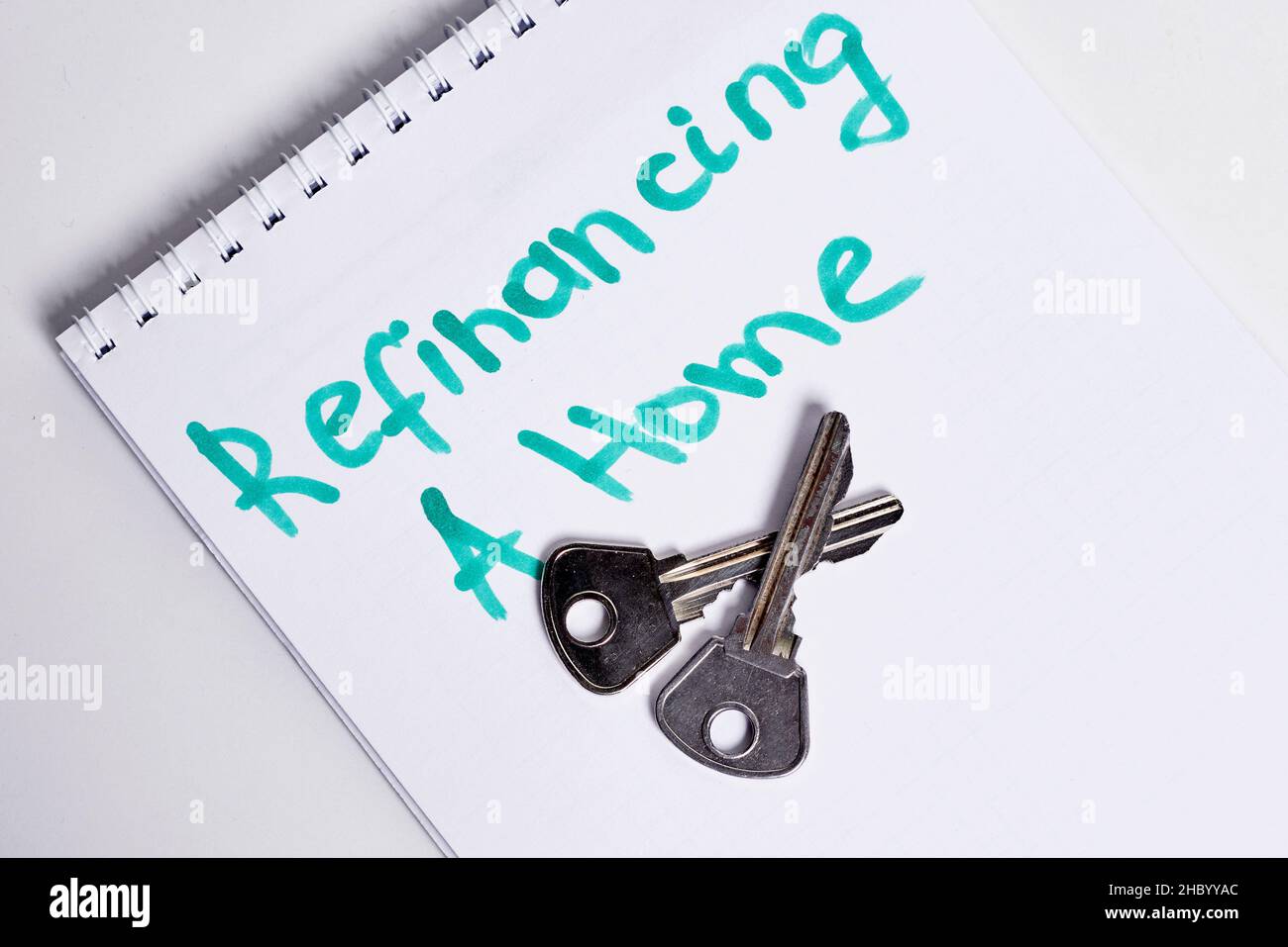 Refinancing a home concept. House keys, calculator and money Stock ...