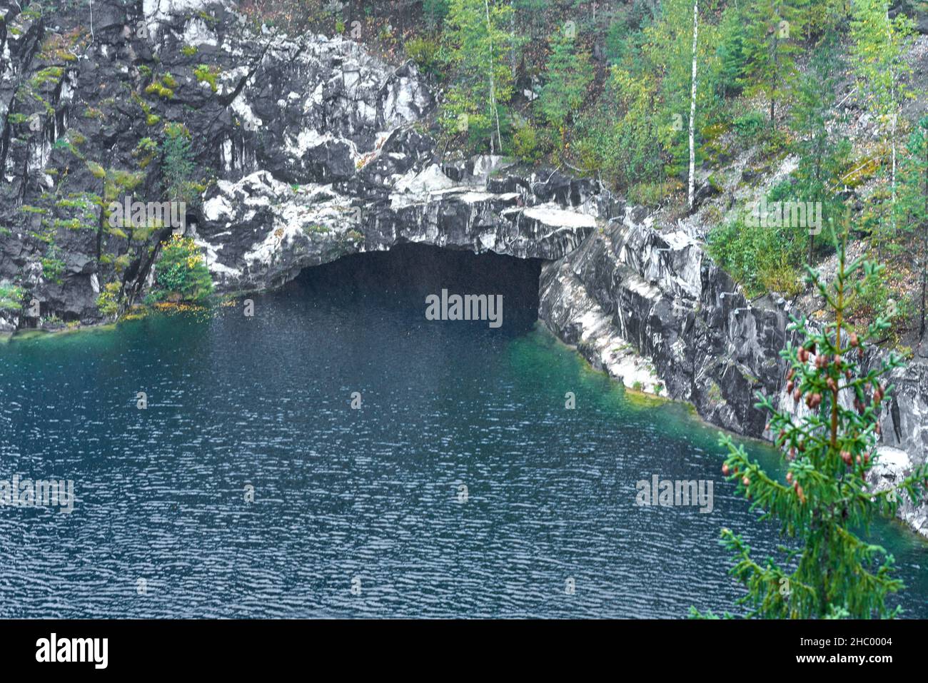A marble cave above a flooded mountain quarry in Ruskeala Park, Karelia ...