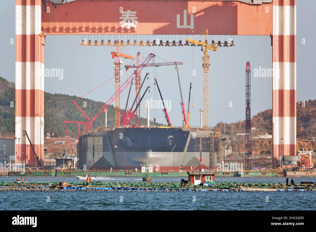 YANTAI, CHINA - DECEMBER 21, 2021 - A super large special ship is under ...