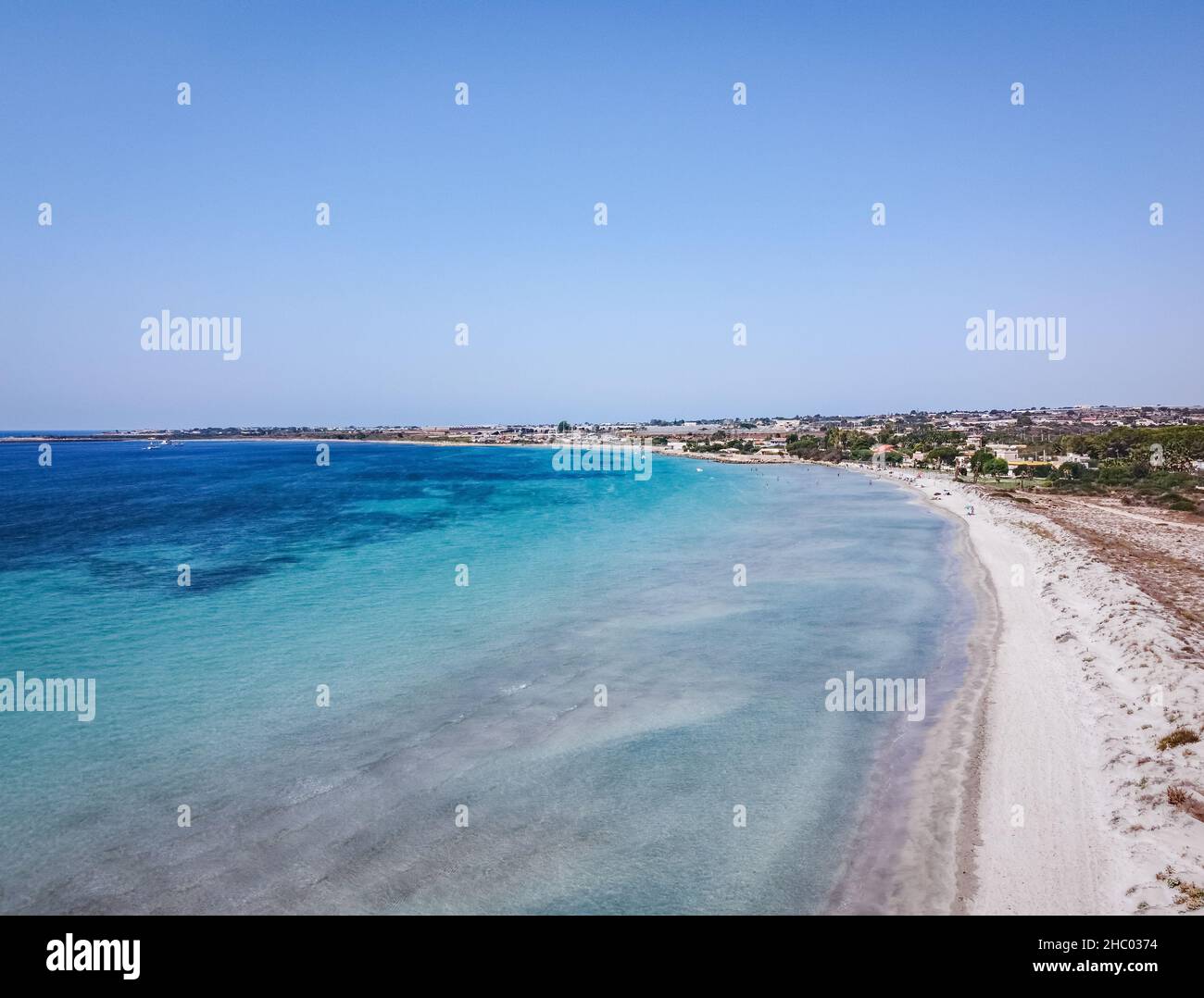 Aerial drone view of the beach and harbour of Portopalo di Capo Passero ...