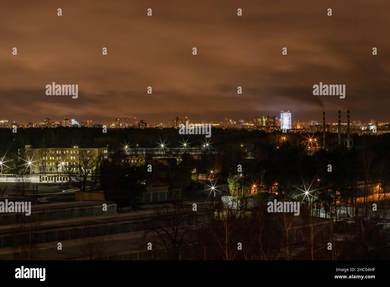 Night city view. Cityscape in twilight with buildings, lights from ...