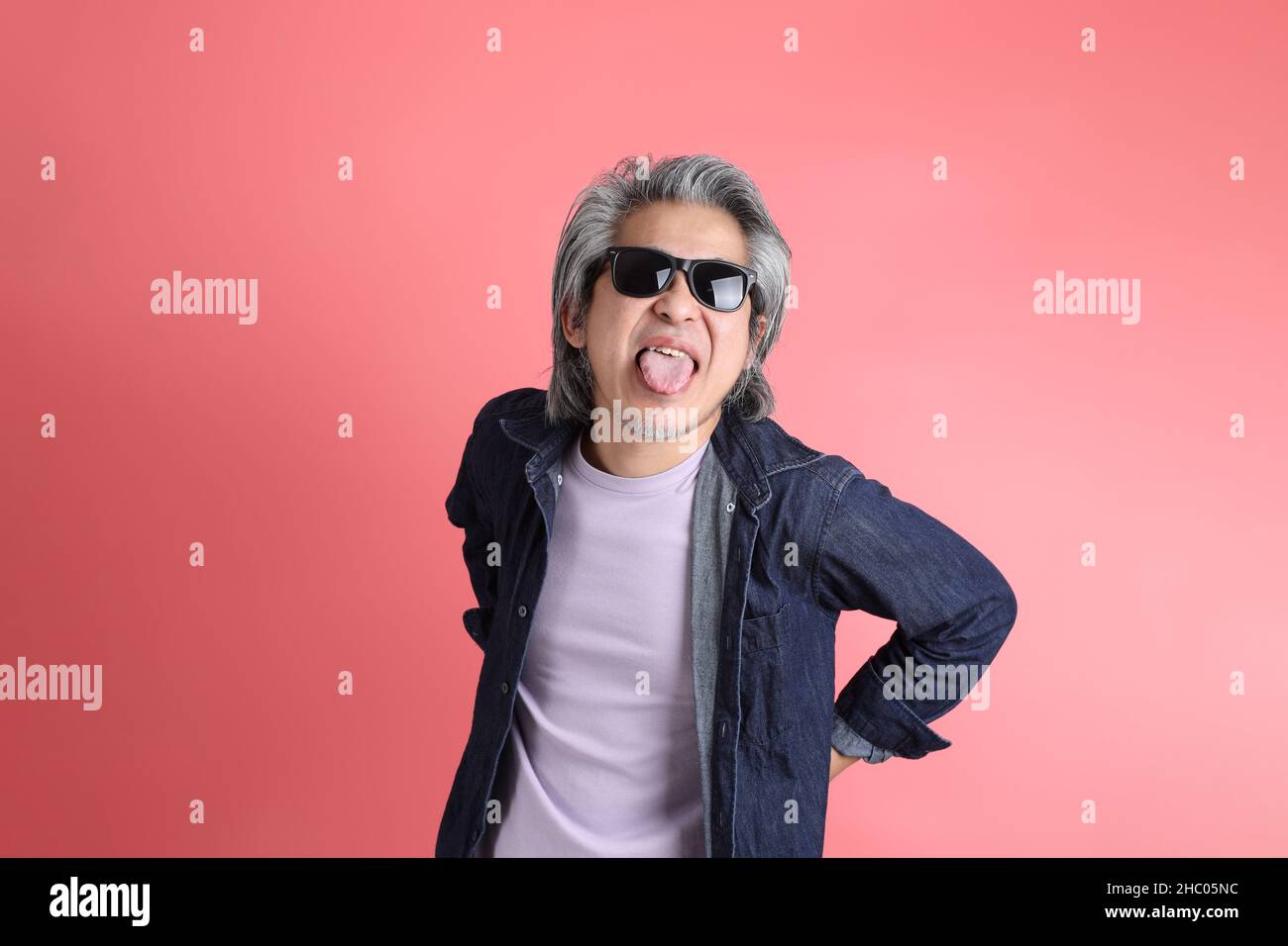 Happy funny man standing out hi-res stock photography and images - Alamy