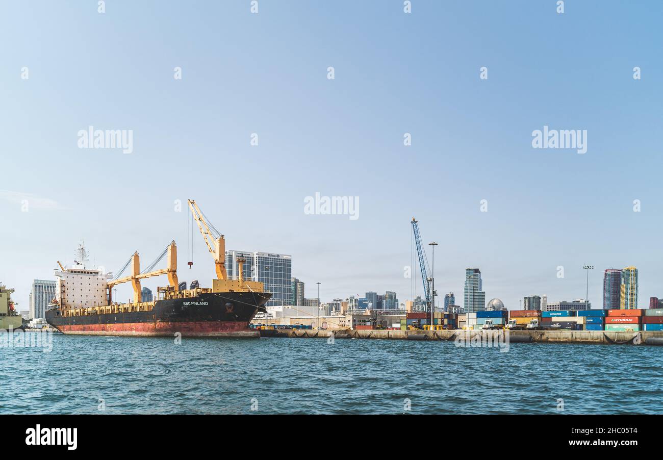 Commercial cargo container ship docked in San Diego harbor Stock Photo ...