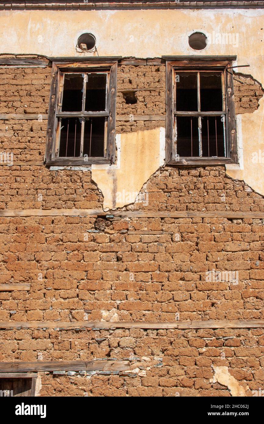 plaster and Brick Wall detail, wooden windows , abstract background ...