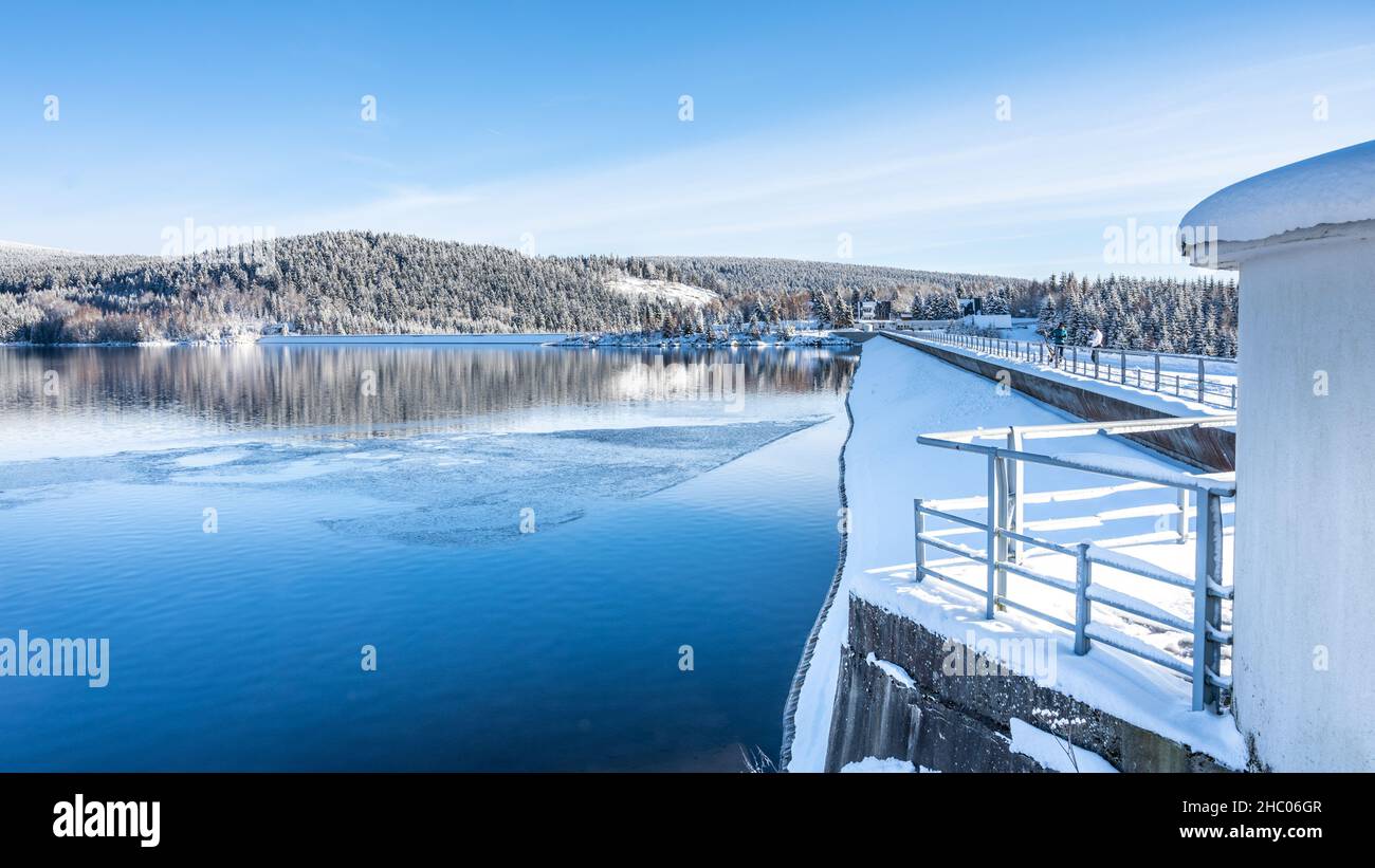 Winter scenery with mountain forests and water reservoir Stock Photo ...
