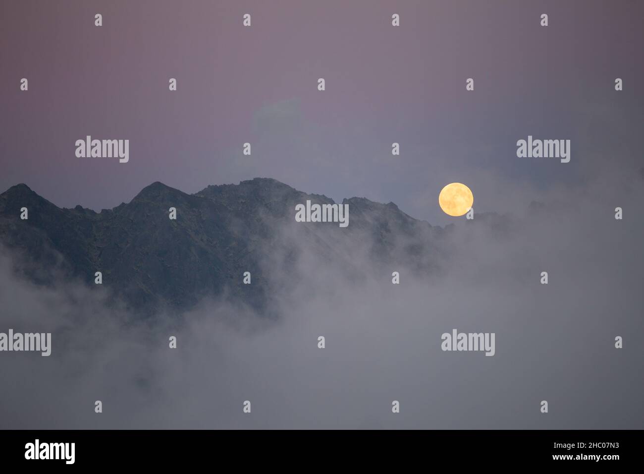 Full moon over roof hi-res stock photography and images - Alamy