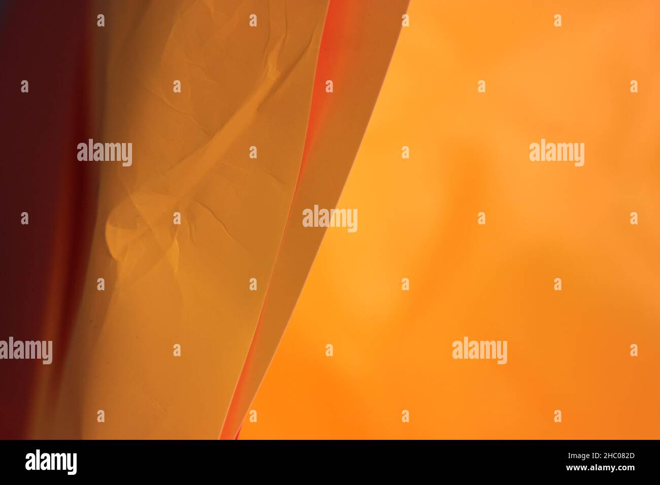 Crumpled yellow orange mustard paper abstract background and texture ...