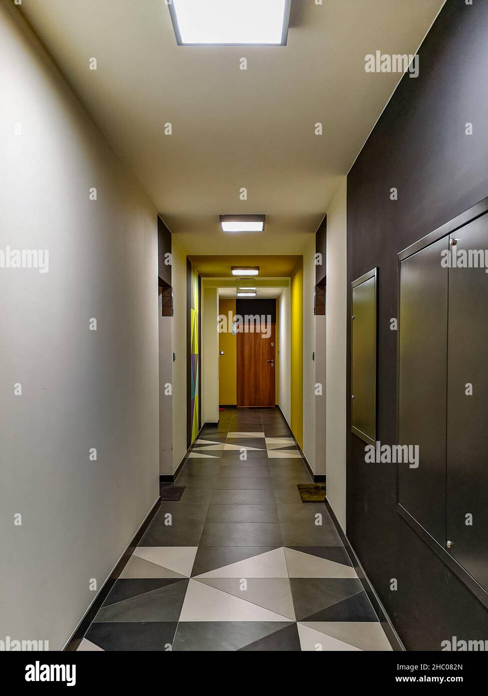 Corridor of modern block of flat with modern apartments Stock Photo - Alamy