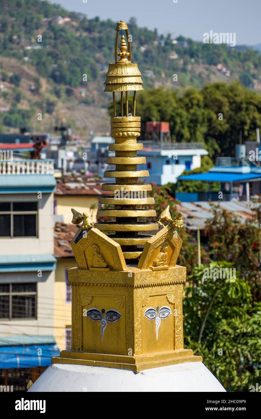 Detail of the tower and spire of a small Buddhist stupa by the ...