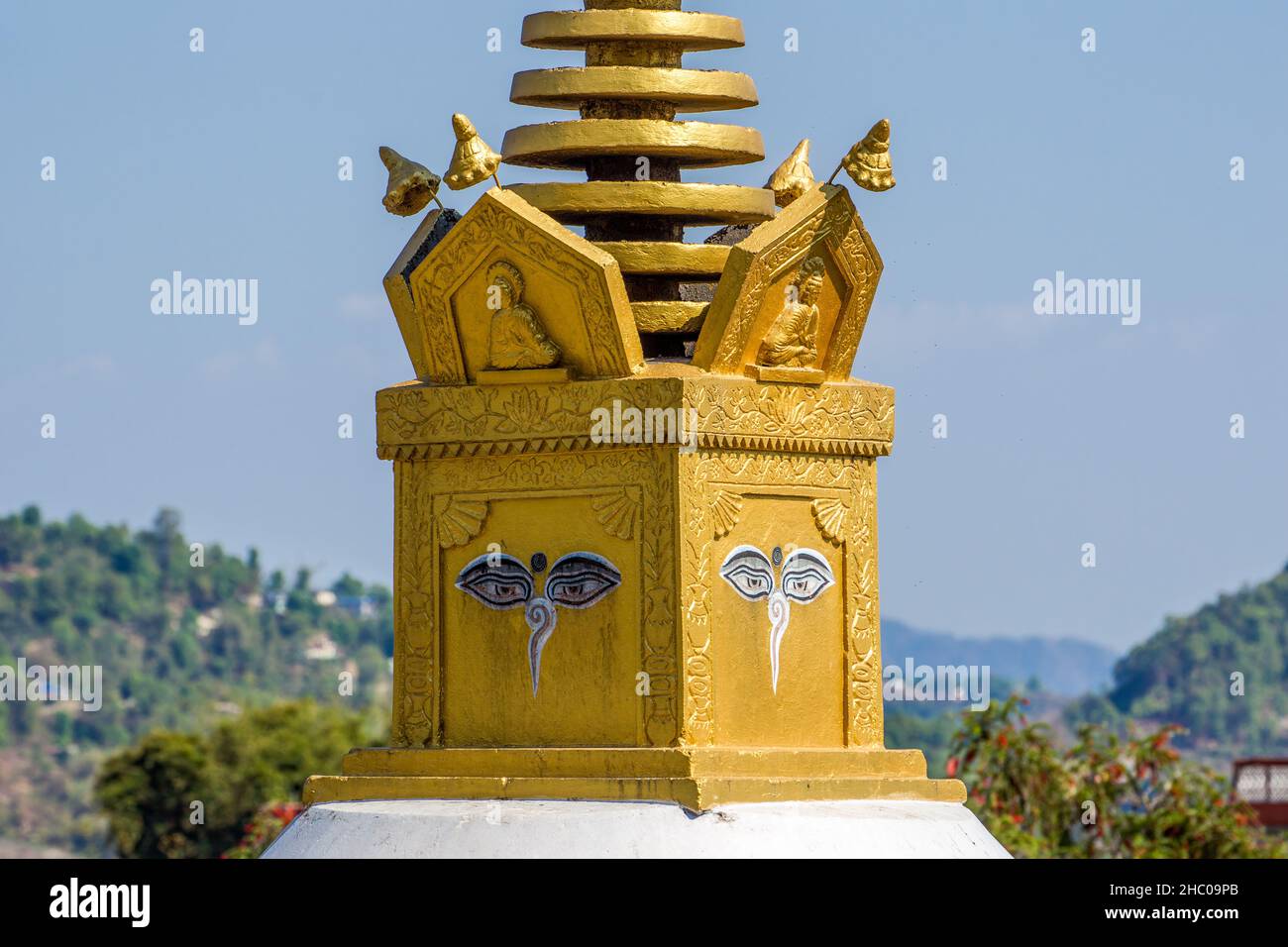 Detail of the tower and spire of a small Buddhist stupa by the ...