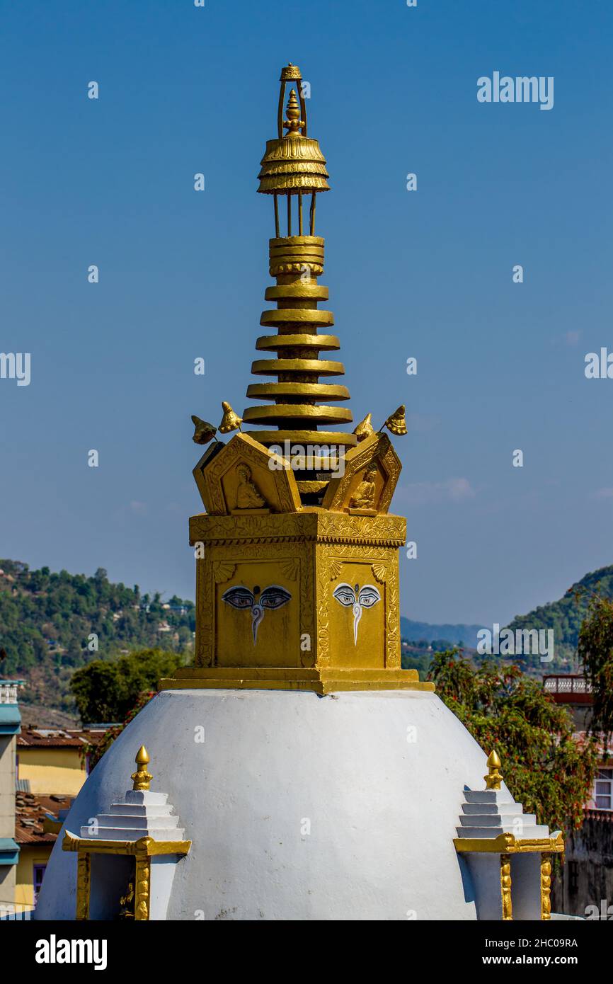 Detail of the tower and spire of a small Buddhist stupa by the ...