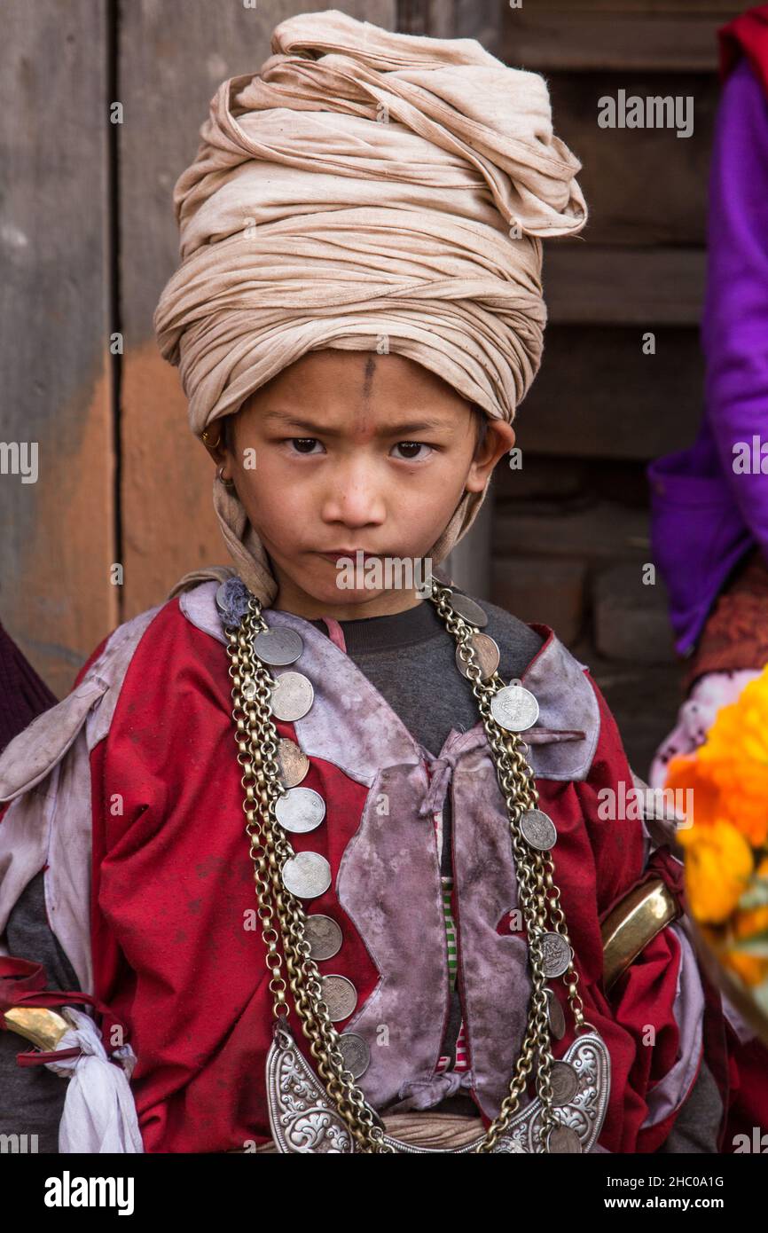 A young costumed and turbaned dancer at the Navadurga Dance Festival in ...