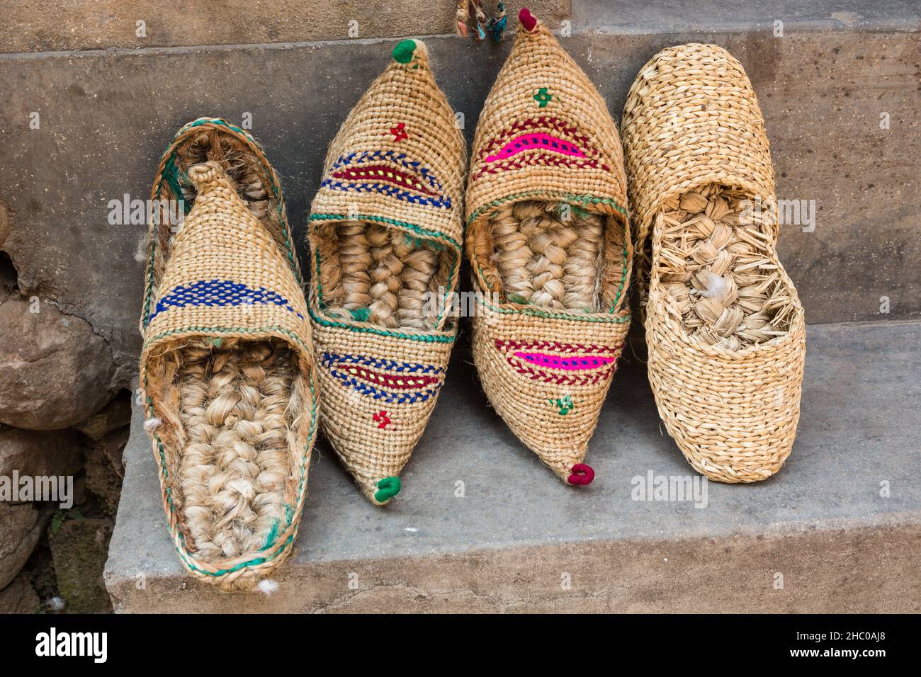 Nested pairs of raditional Nepali shu ya lakkan sandals made from rice ...