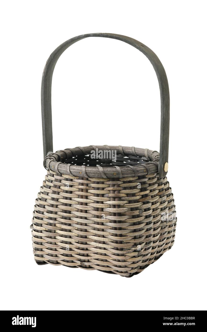 Dark wicker vintage rustic basket, isolated on white Stock Photo - Alamy