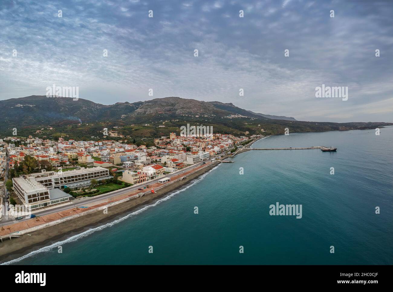 Aerial cityscape view of Neapolis town at sunset. Also named Vatika in ...