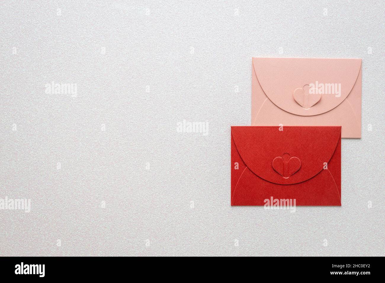 occasional decorative red and pink envelopes with a heart-shaped clasp ...