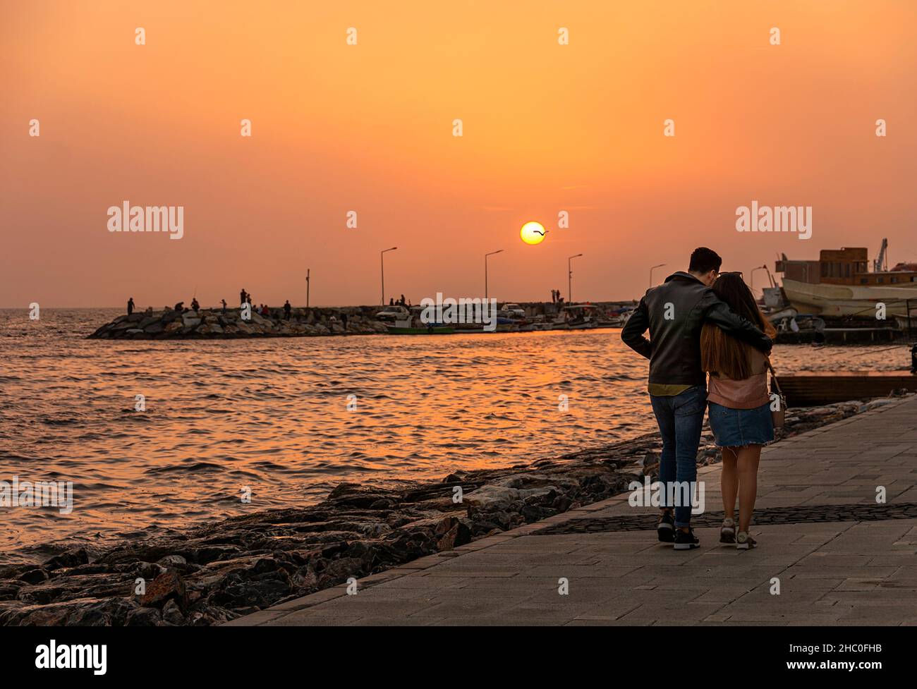 Young couple fishing italy hi-res stock photography and images - Alamy