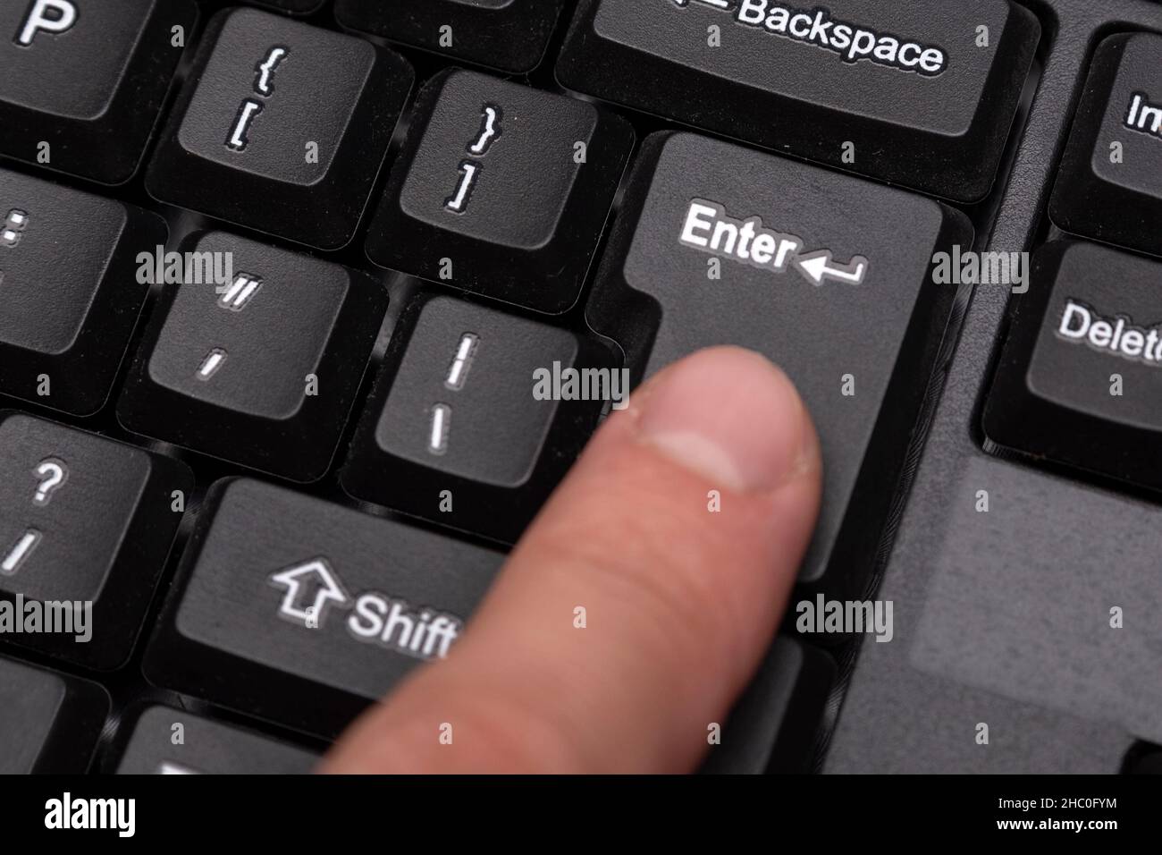 Finger presses enter button hi-res stock photography and images - Alamy