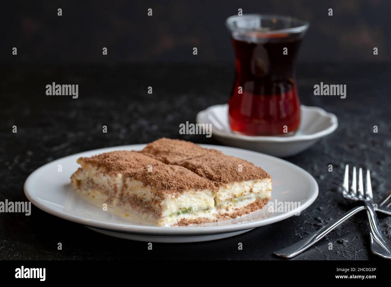 Cold baklava on a dark background. Turkish sweet dessert concept. plate ...
