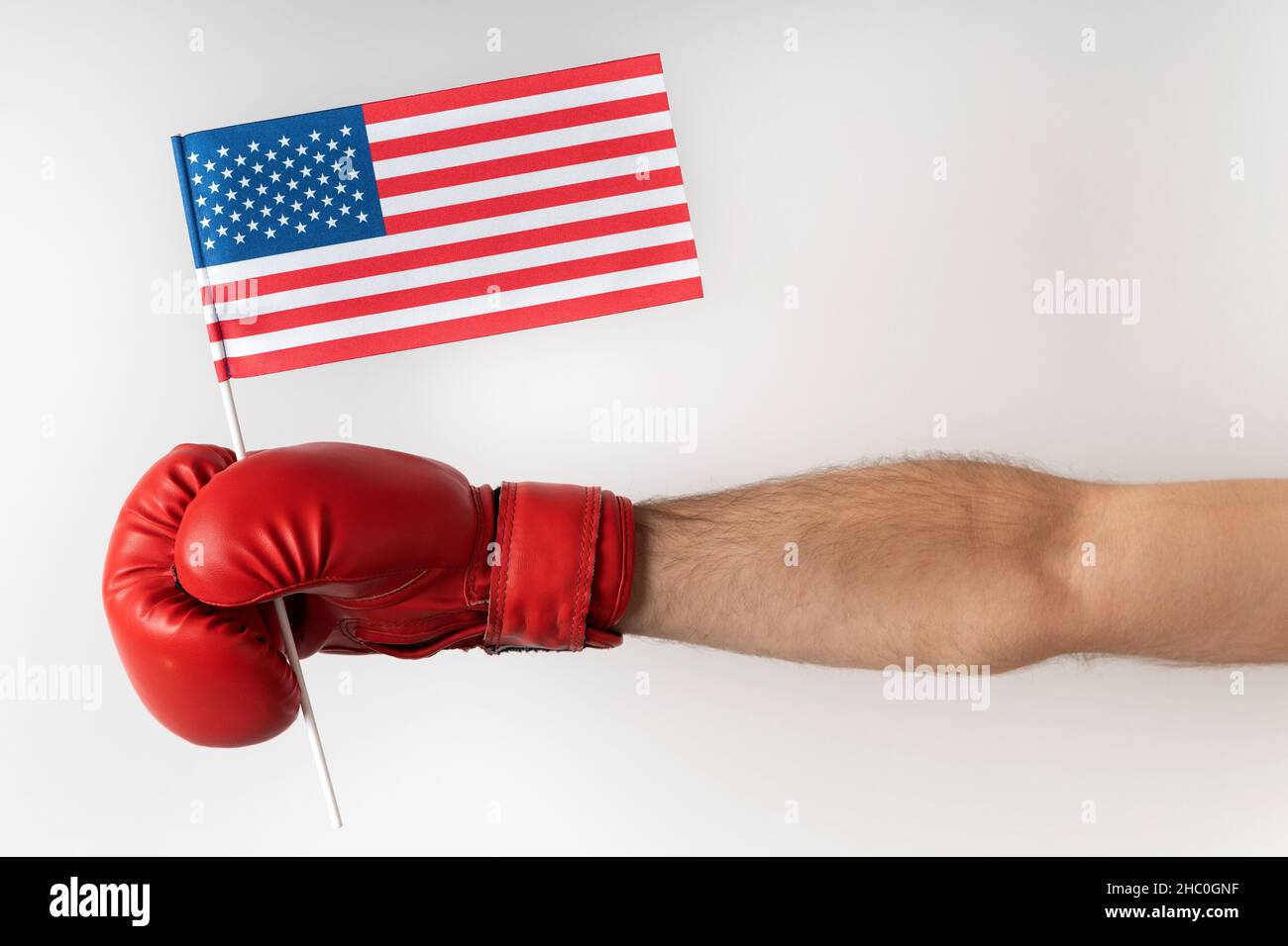 Boxing glove with USA flag. Boxer holds flag of United States. White ...