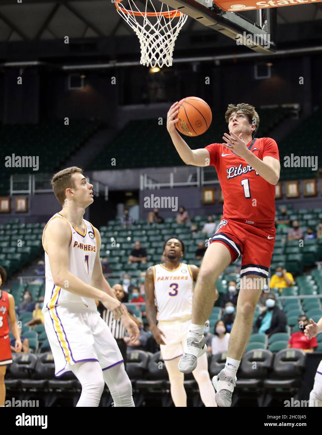 December 22, 2021 - Liberty Flames guard Brody Peebles #1 goes in for a ...