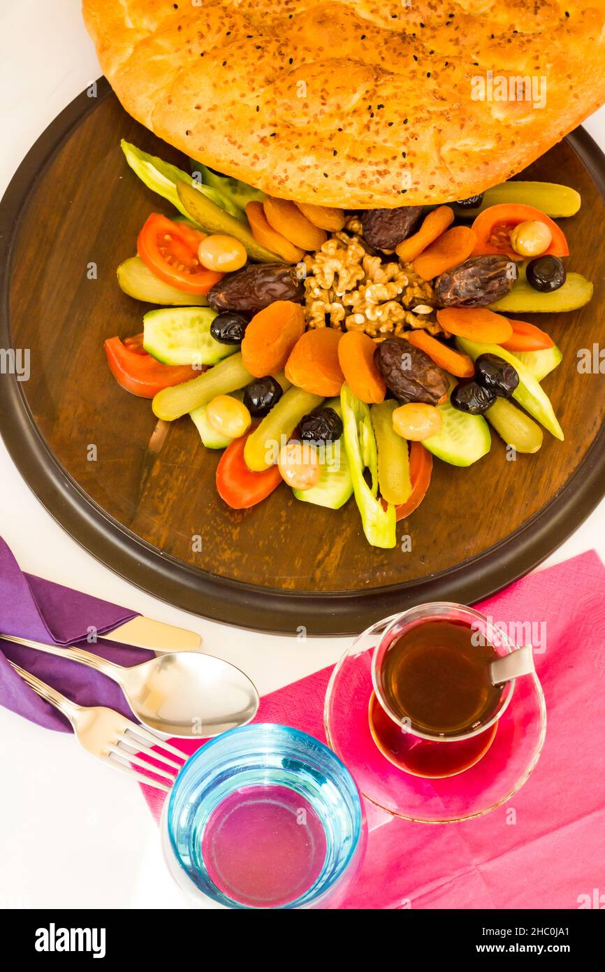 Traditional Turkish Ramadan Iftar Wooden Plate with Ramadan Bread and ...