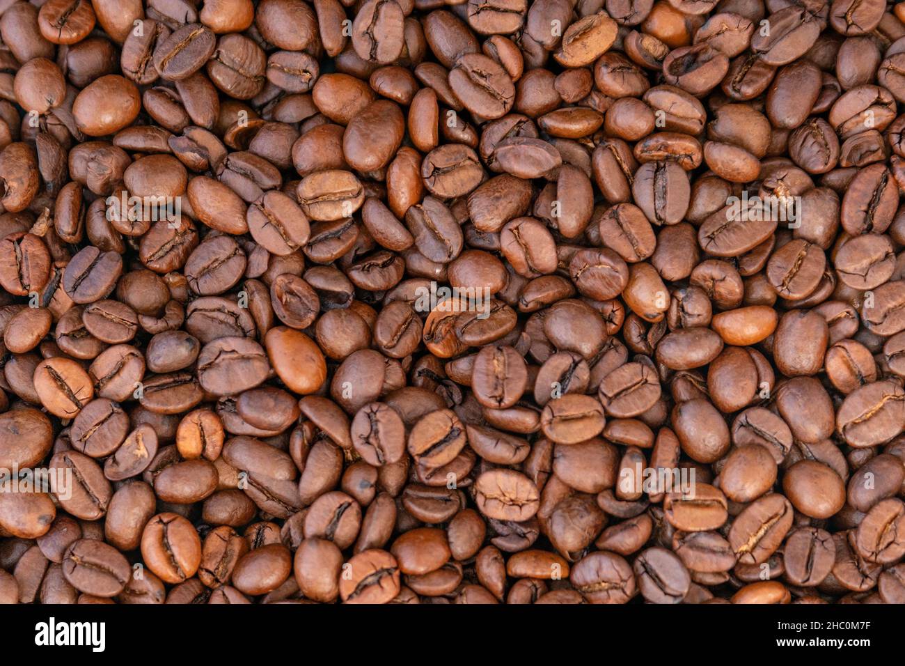 Roasted coffee beans top view, close-up. Arabica beans. Natural coffee ...