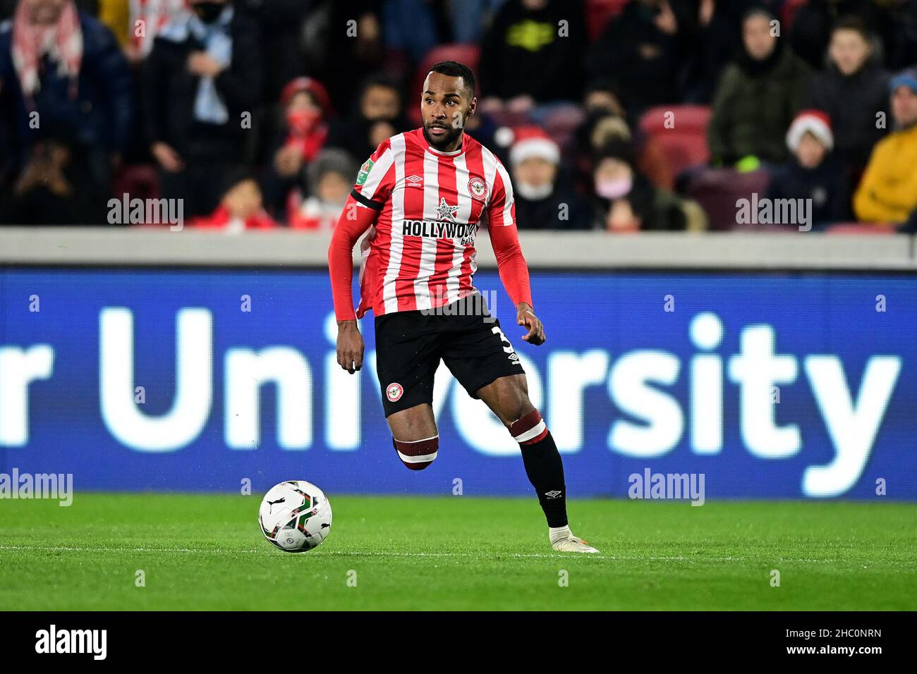 London, UK. 22nd Dec, 2021. Rico Henry #3 of Brentford in London ...