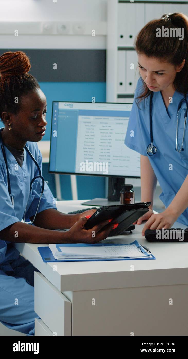 Medical team working with digital tablet for healthcare system in ...