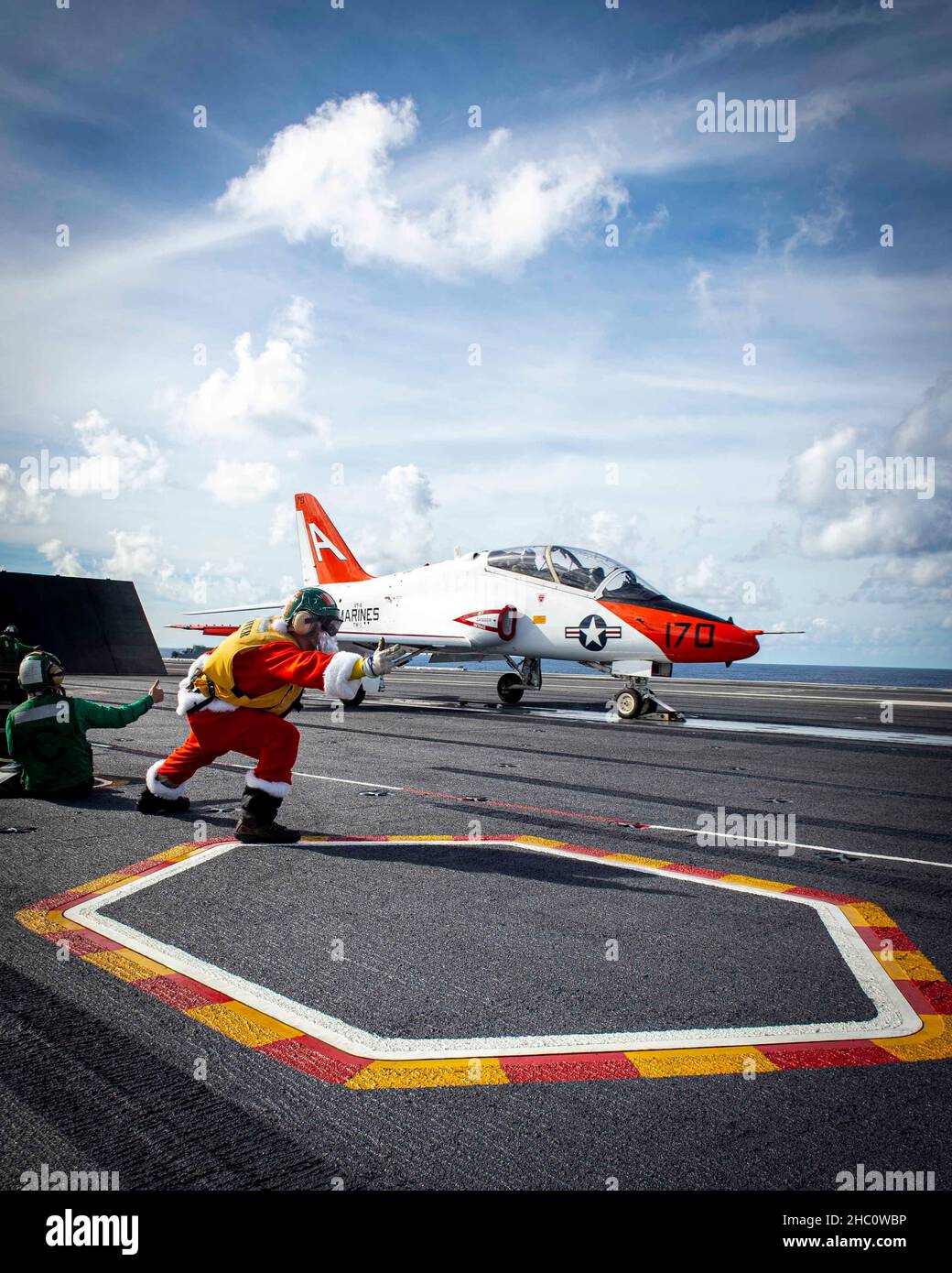 Lt. Cmdr. Rob Nelson, right, a shooter assigned to the aircraft carrier ...