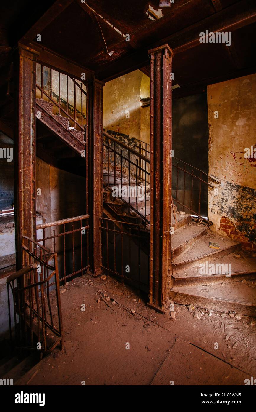 Old rusty staircase at the old ruined abandoned mansion Stock Photo - Alamy