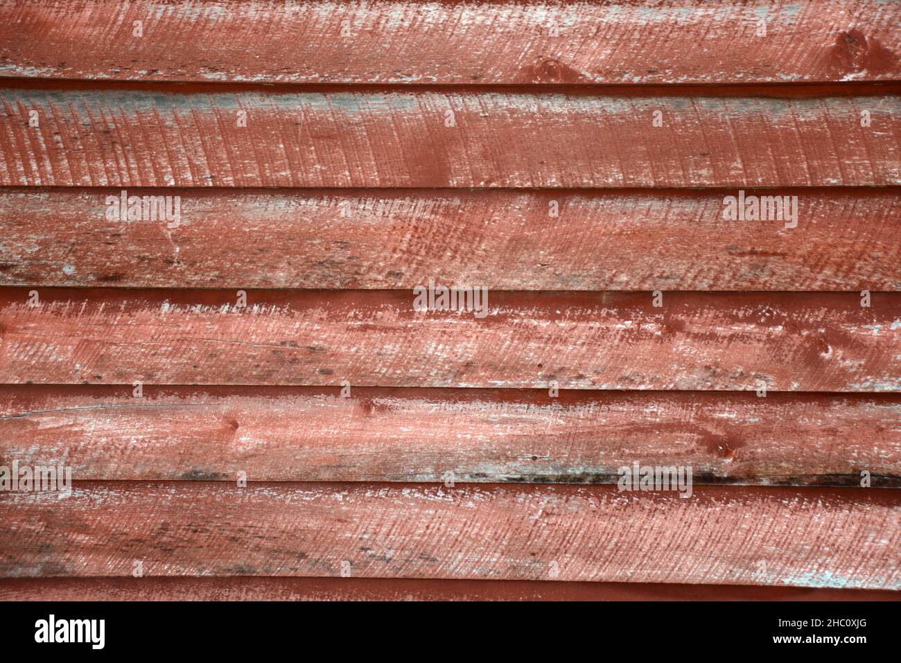 old weatherboards on an historic building create a rustic textured ...