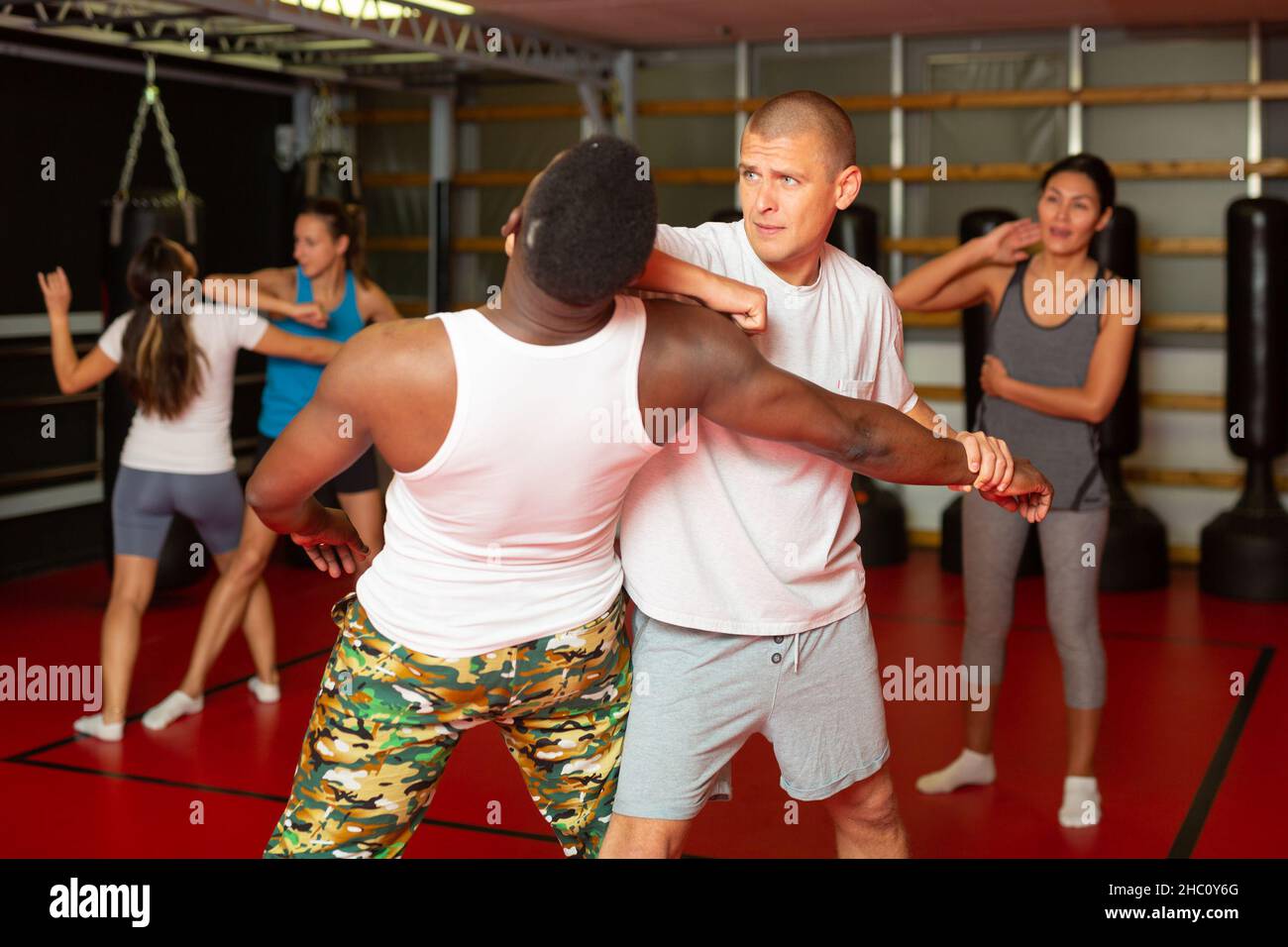 Two man training captures on self-defense course Stock Photo - Alamy