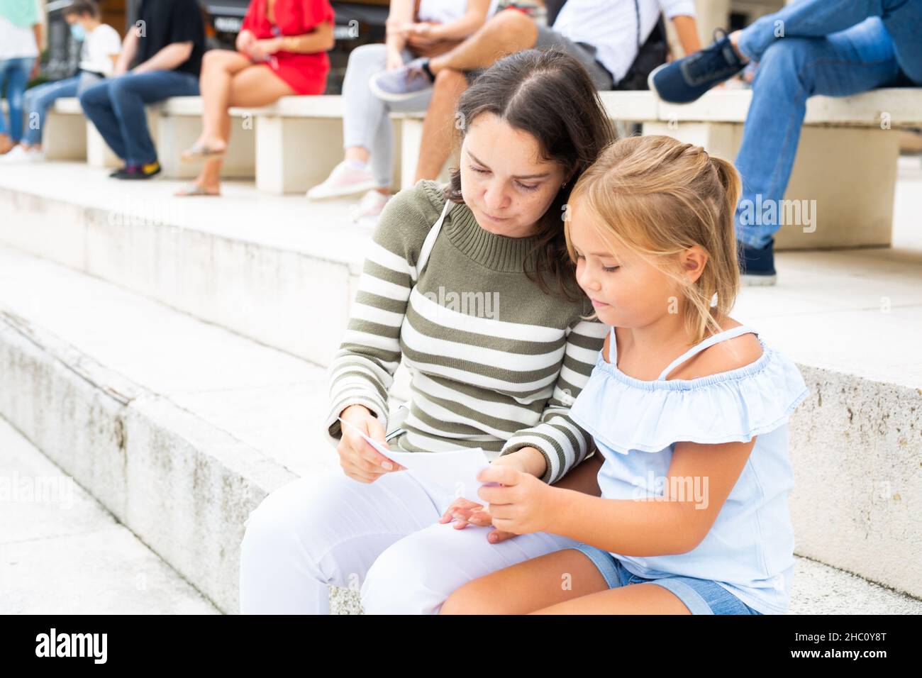 Mother and daughter looking at sight during sightseeing tour Stock ...