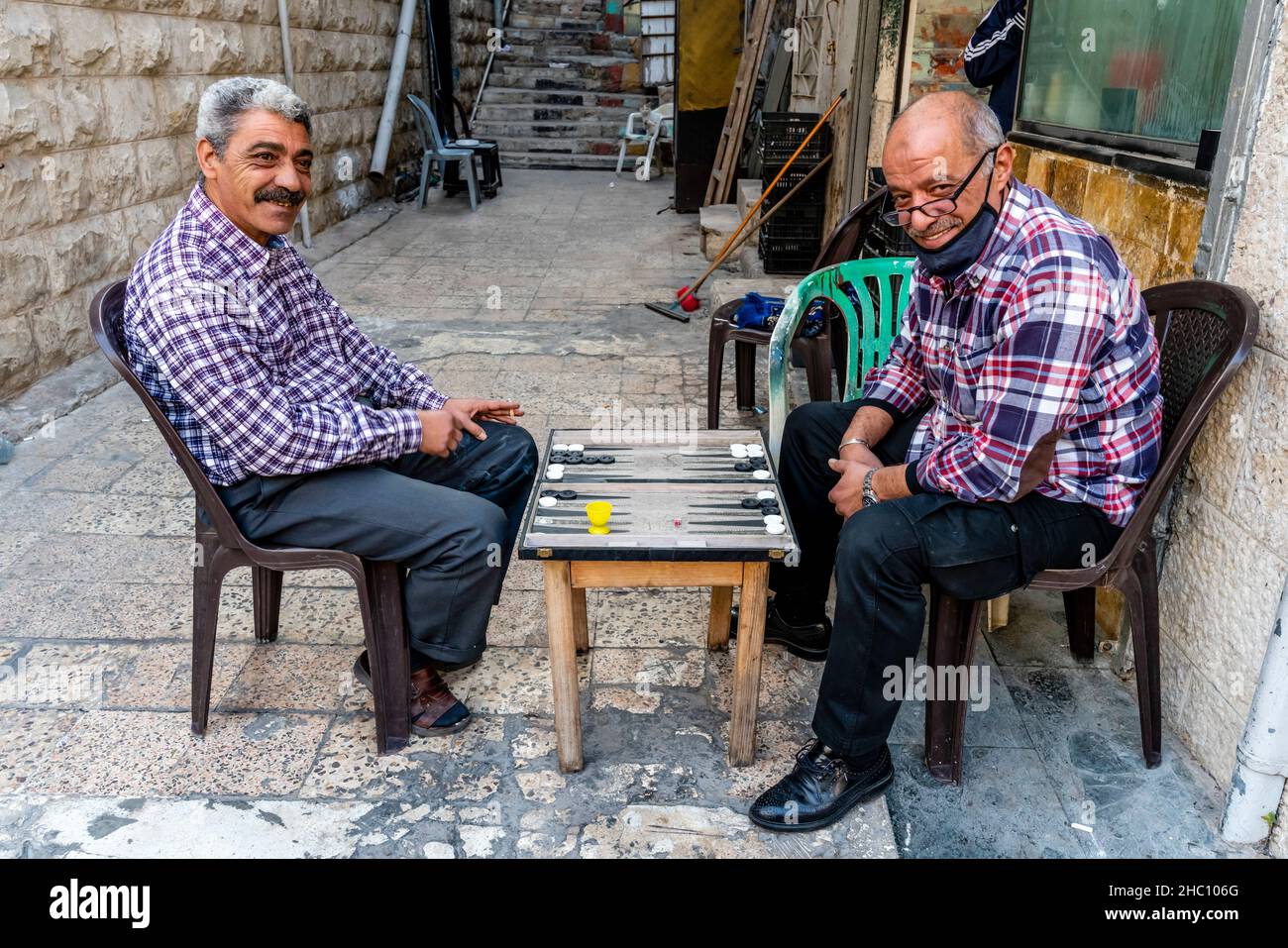 Two Jordanian Men Playing Backgammon In The Street, Amman, Jordan Stock ...