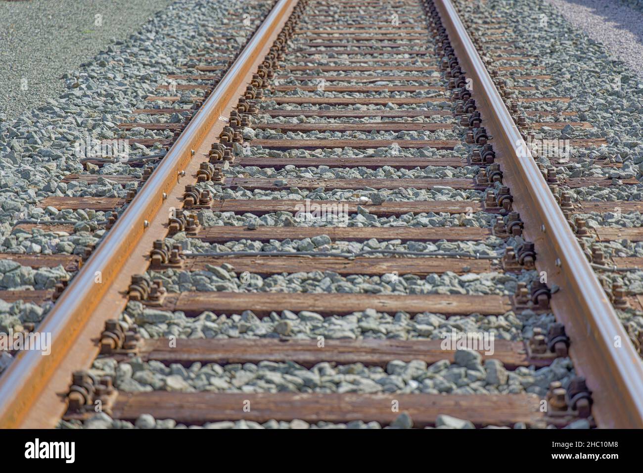 Train railroad tracks close up Stock Photo - Alamy