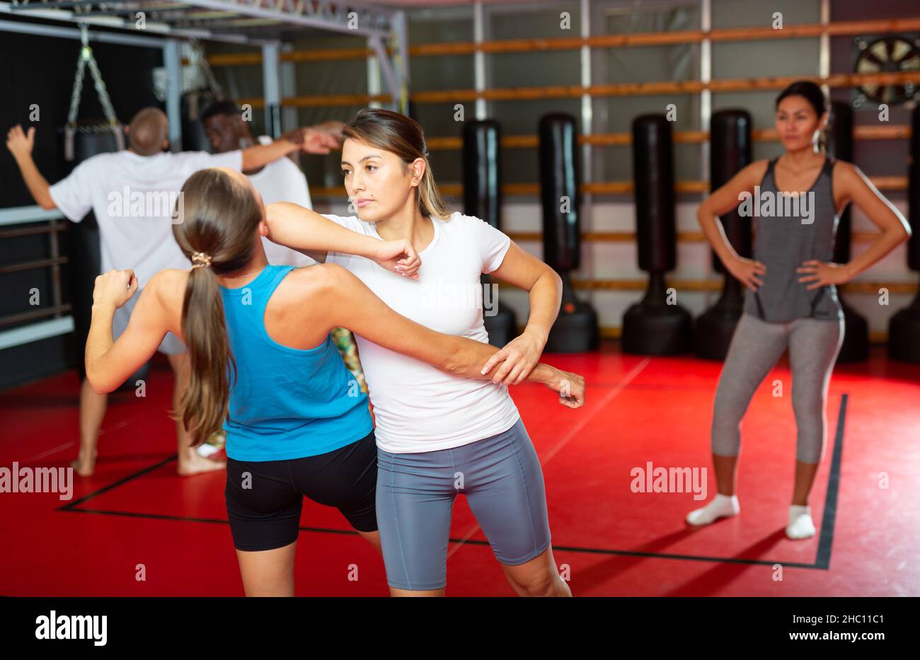People sparring during self-defence group training Stock Photo - Alamy