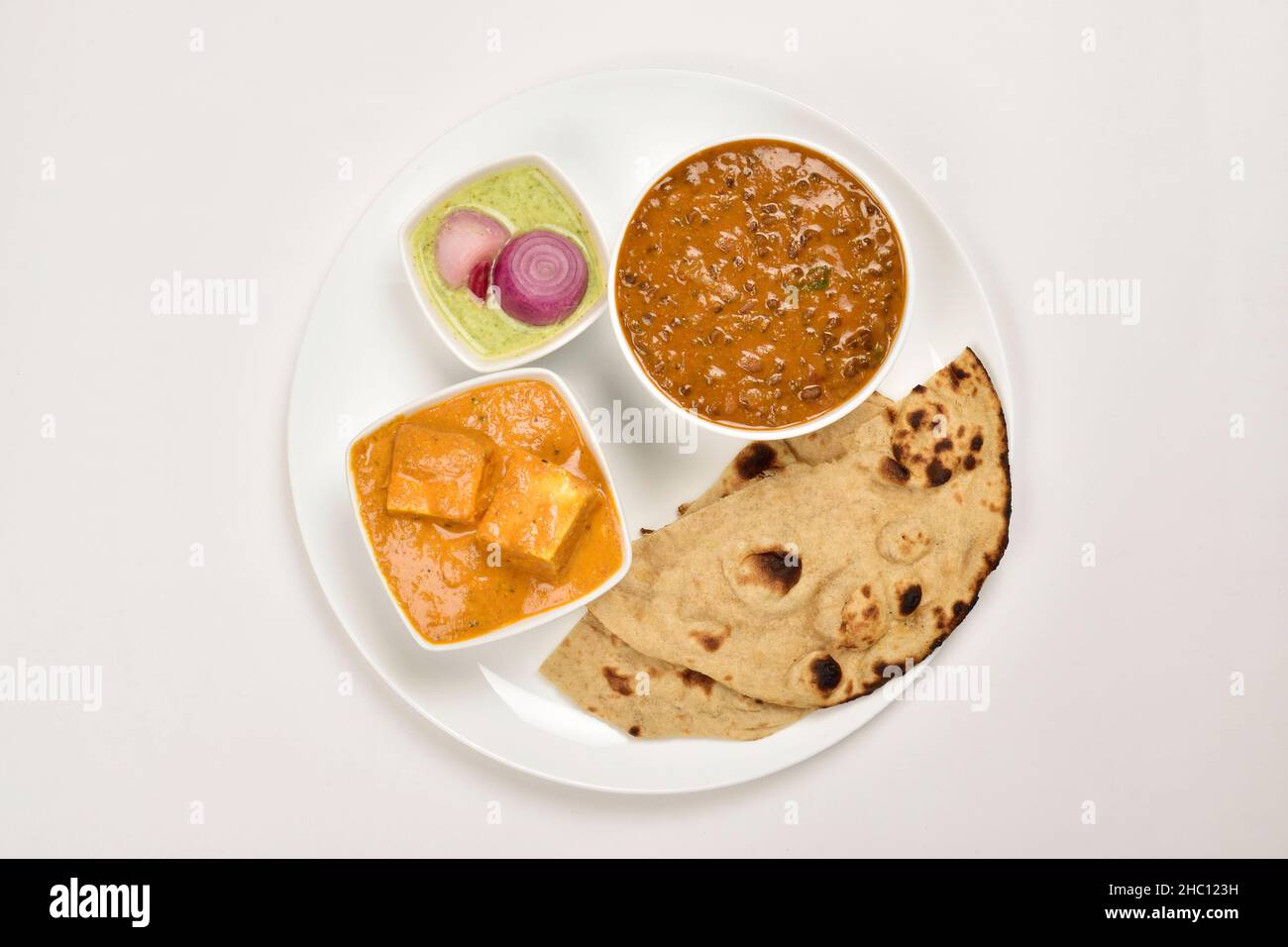 Dal Makhani and Shahi Paneer Served with Roti in Plate Stock Photo - Alamy