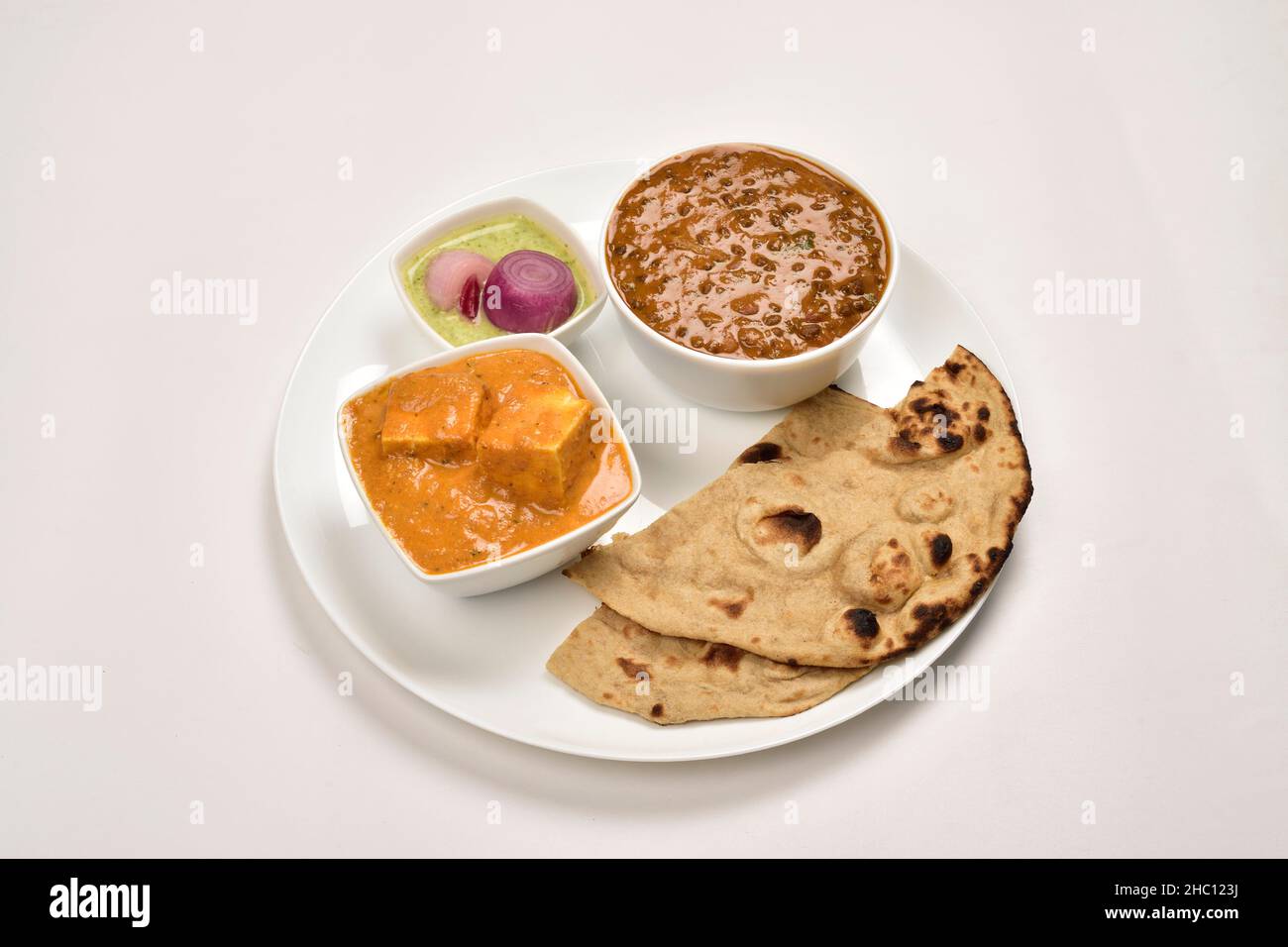 Paneer Butter Masala and Daal Makhani Served with Tandoori Roti in ...
