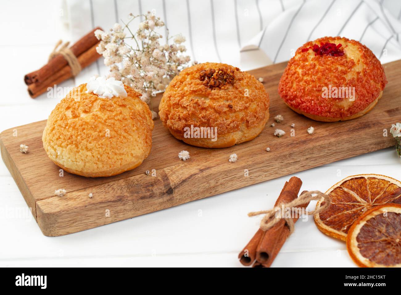 Homemade three shu cake with vanilla custard inside Stock Photo - Alamy